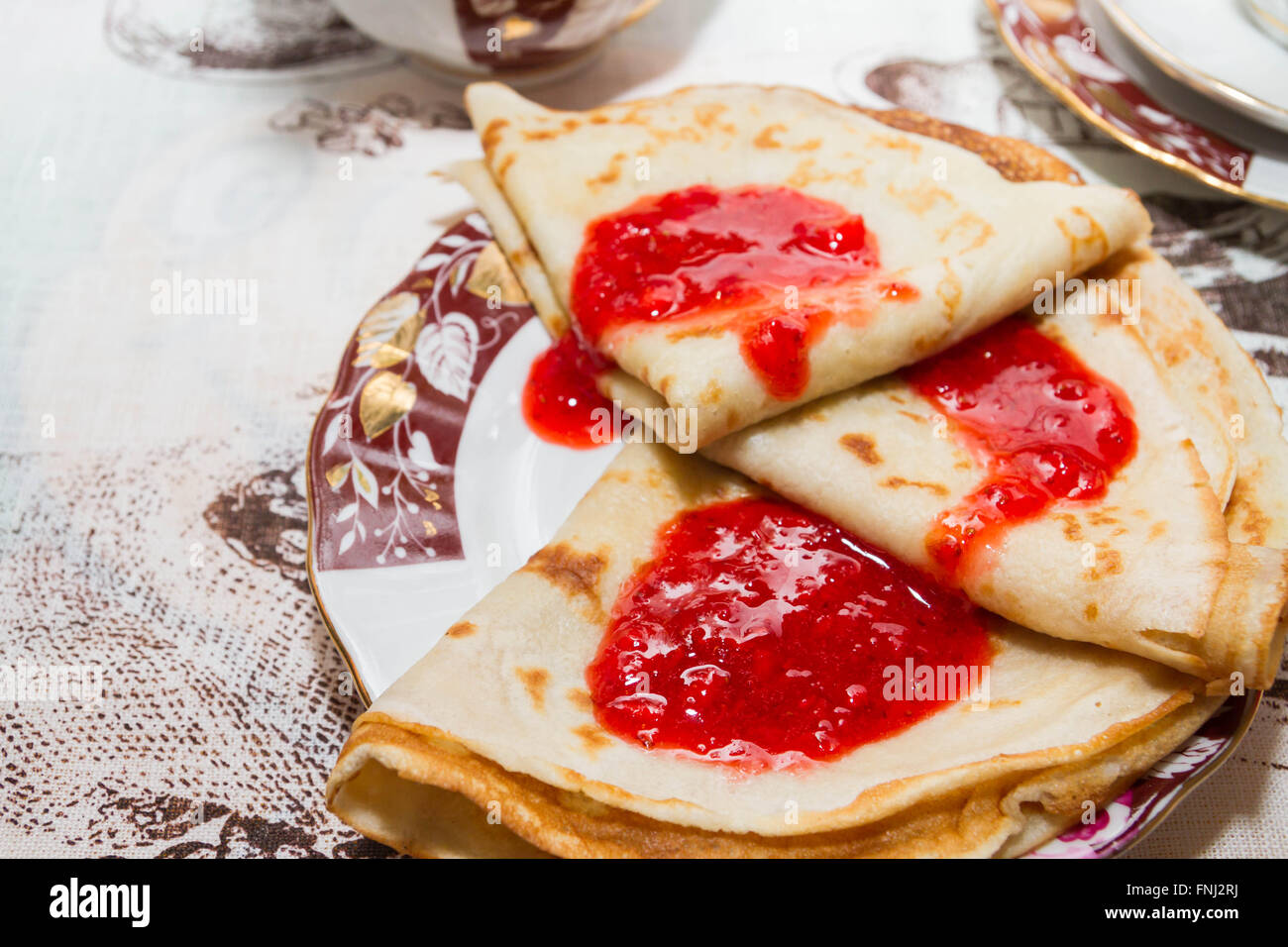 Pancakes with fresh strawberry jam for Breakfast Stock Photo - Alamy