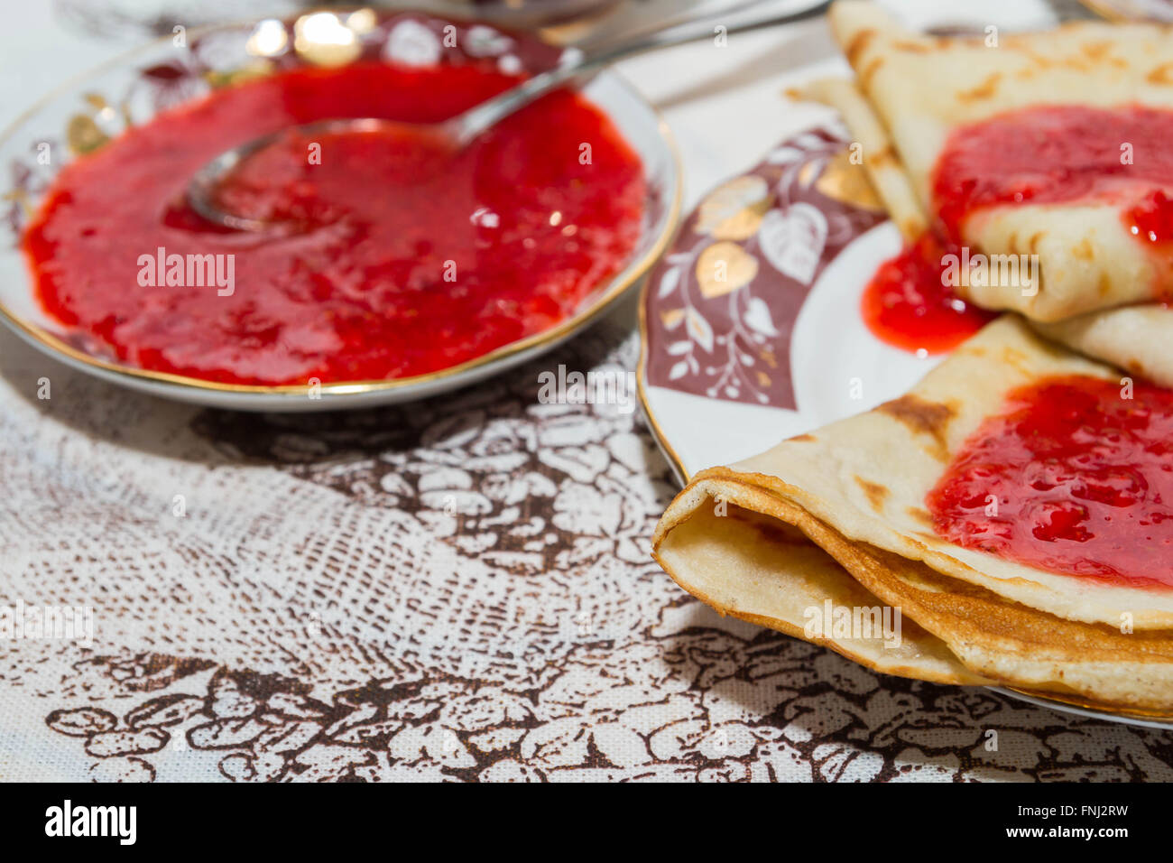 Pancakes with fresh strawberry jam for Breakfast Stock Photo - Alamy