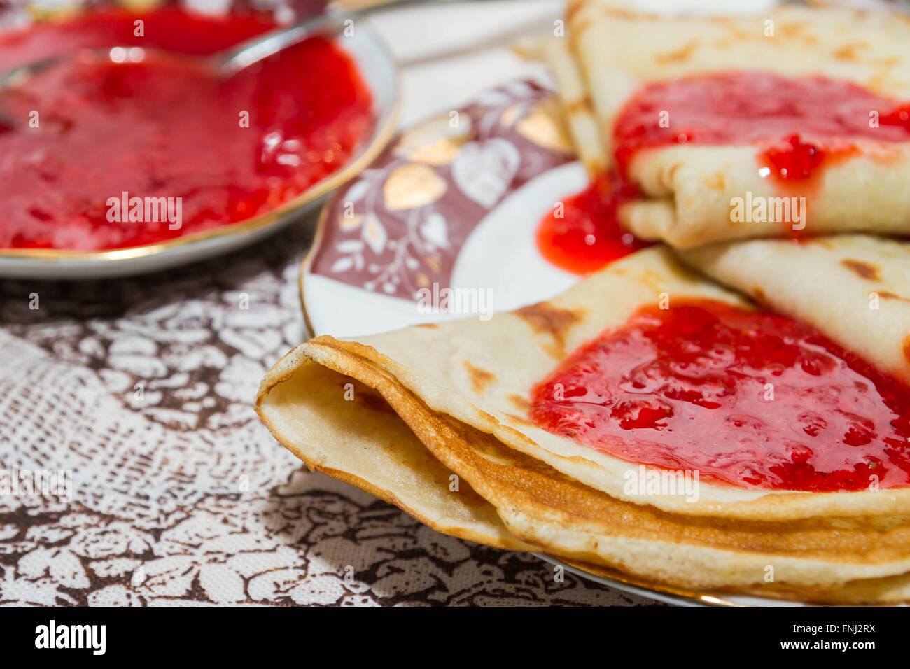 Pancakes with fresh strawberry jam for Breakfast Stock Photo - Alamy