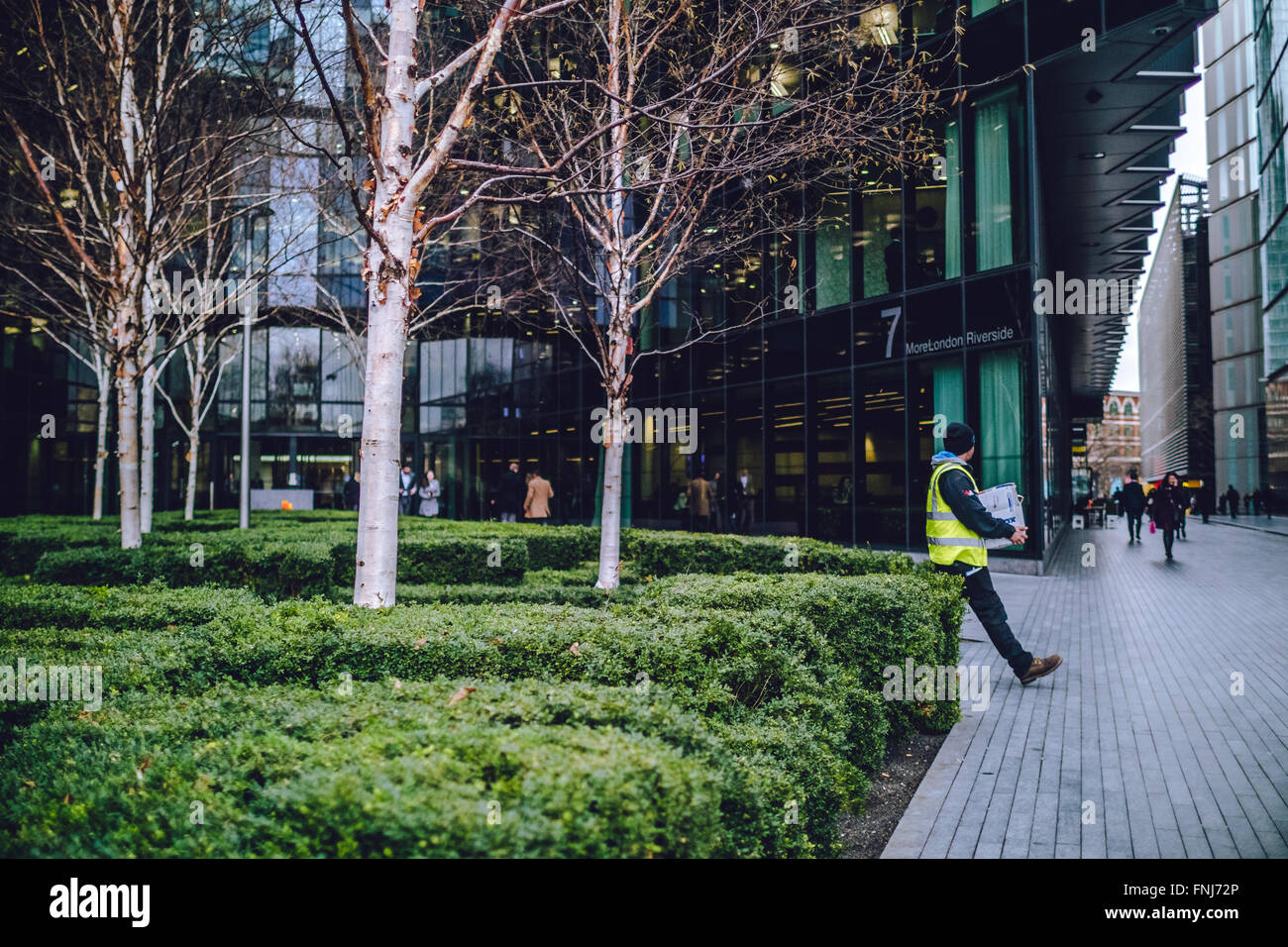 Man walking with boxes hi-res stock photography and images - Alamy