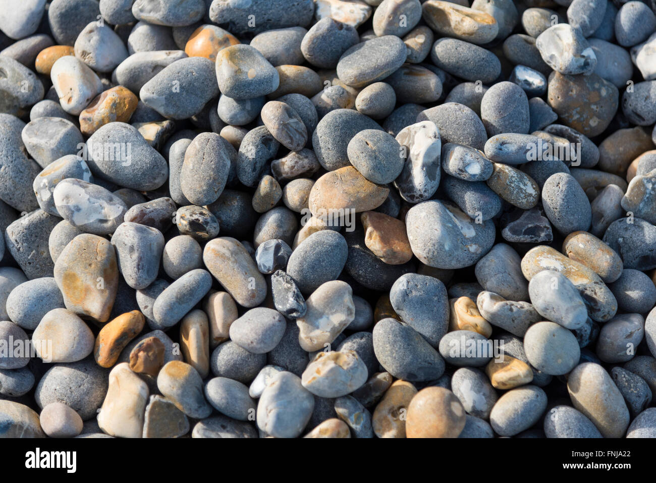 collection of pebbles on the seafront at Sheringham Stock Photo - Alamy