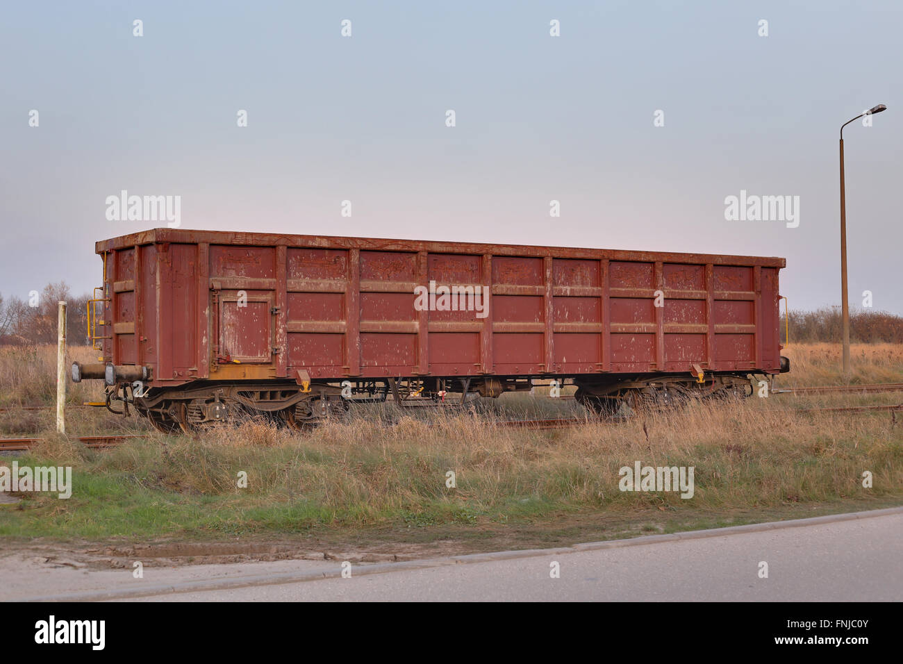 Goods wagon standing on rails in Germany Stock Photo - Alamy
