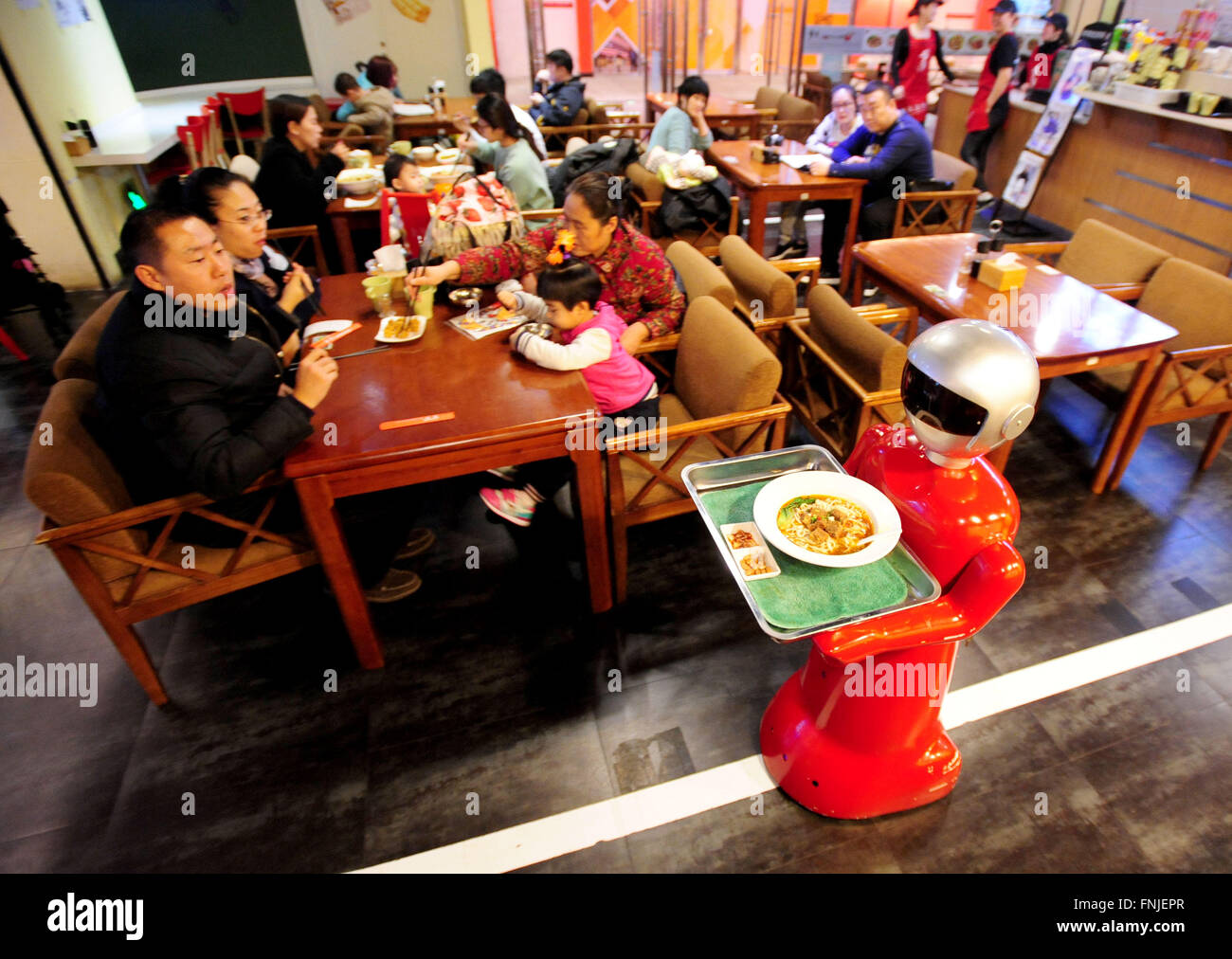 Shenyang, China's Liaoning Province. 15th Mar, 2016. A robot serves ...