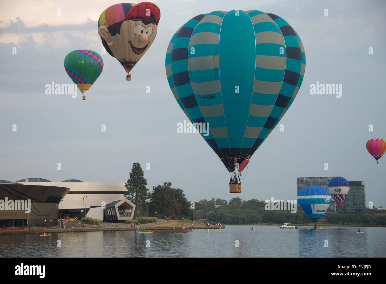 Hot air balloon over lake burley griffin hi-res stock photography and ...