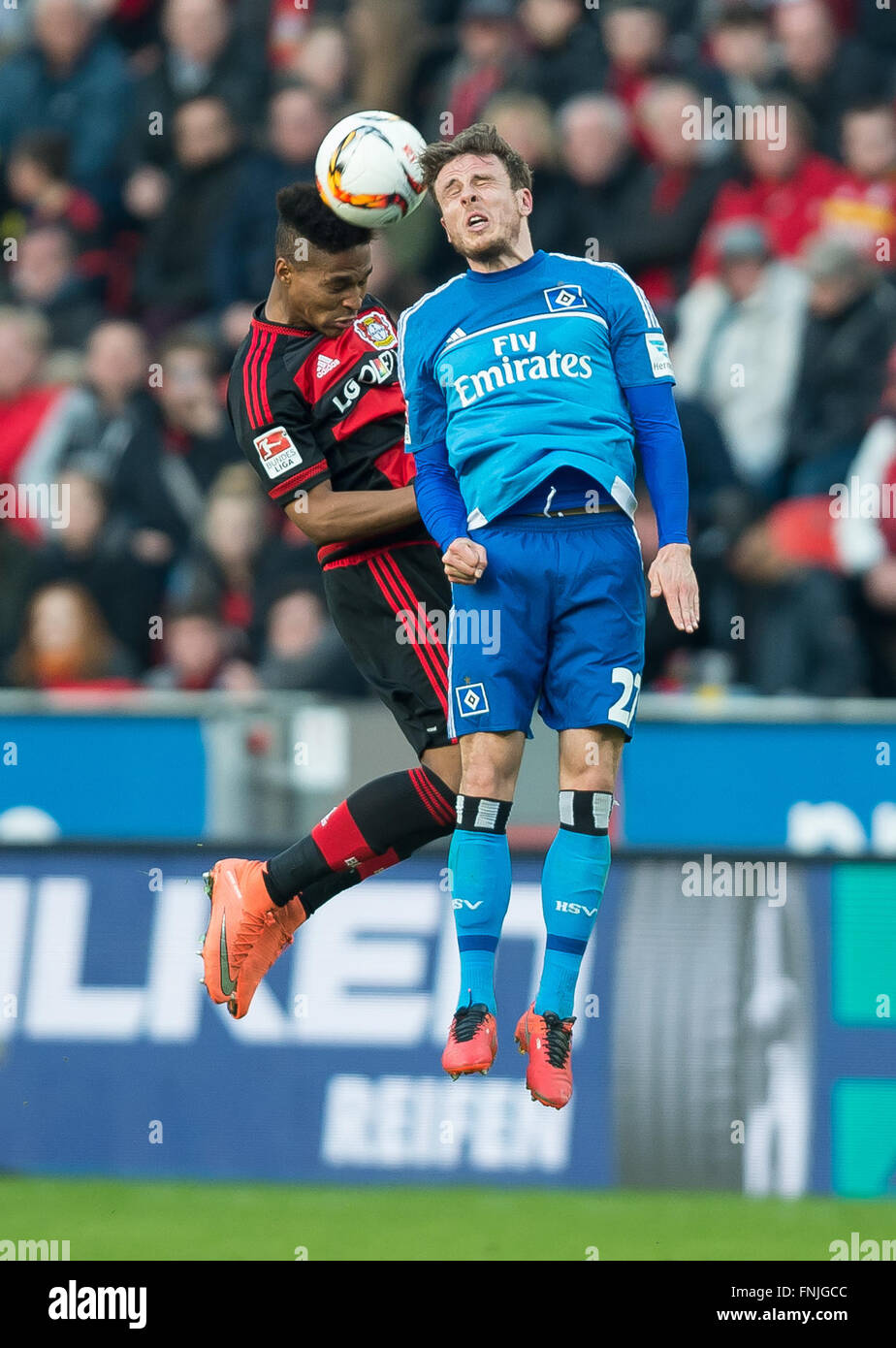 Leverkusen, Germany. 13th Mar, 2016. Hamburg's Nicolai Mueller (r) and ...
