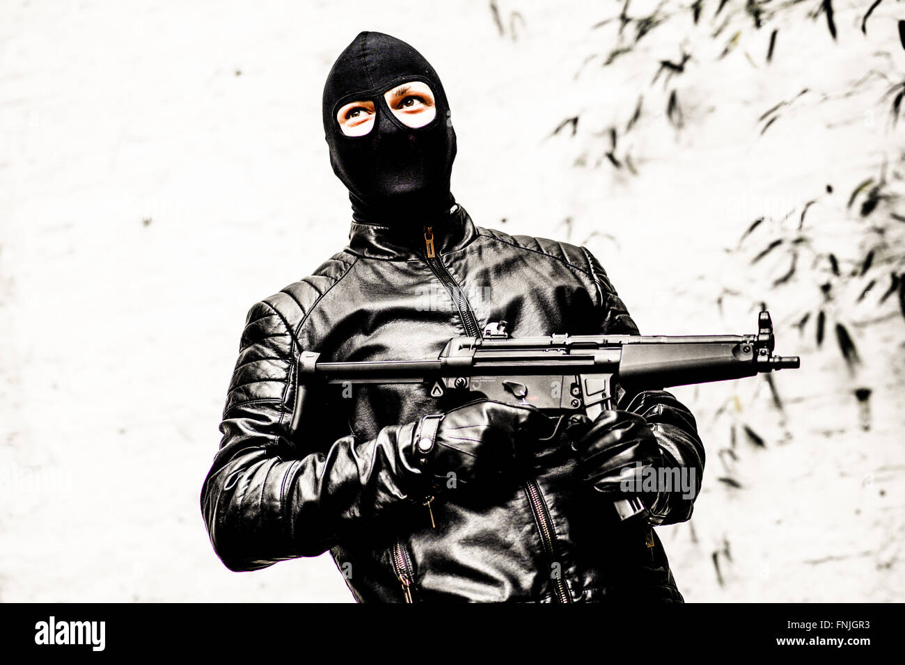 A man with a submachine gun, Germany, Berlin, 20. May 2015. Photo ...