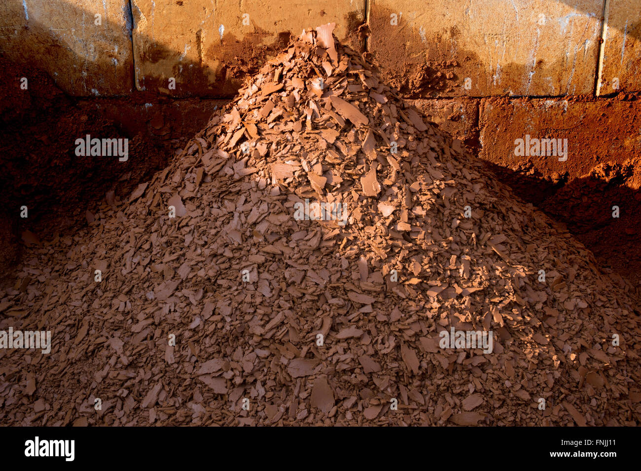 Boxberg, Germany. 14th Mar, 2016. Iron sludge piled up in a collection ...