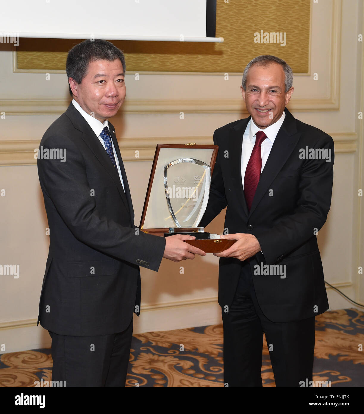 Cairo. 15th Mar, 2016. He Xiaoqing, President of Chery International (L ...