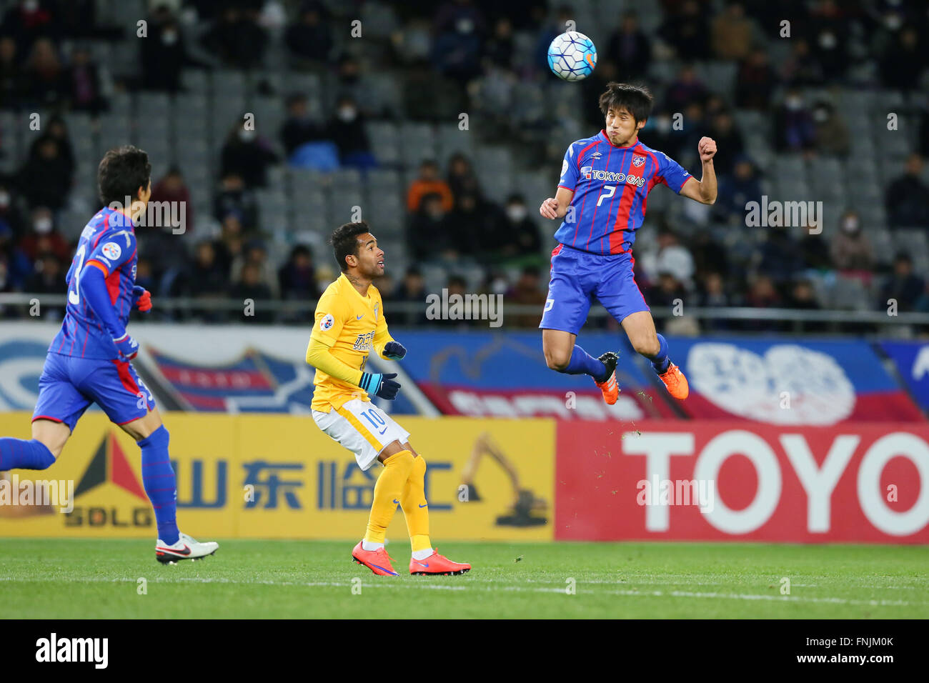 Tokyo, Japan. 15th Mar, 2016. (L-R) Alex Teixeira (Suning), Takuji ...