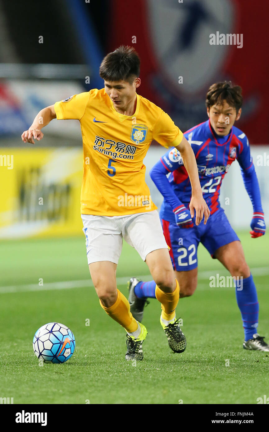 Tokyo, Japan. 15th Mar, 2016. (L-R) Zhou Yun (Suning), Naotake Hanyu ...