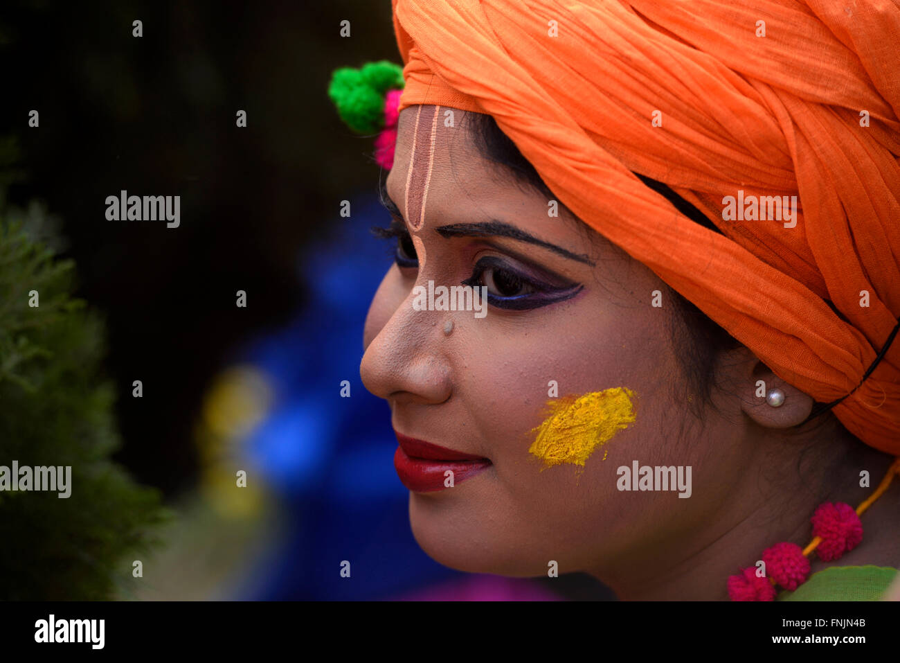Kolkata, India. 15th Mar, 2016. Student enjoys playing abir ...