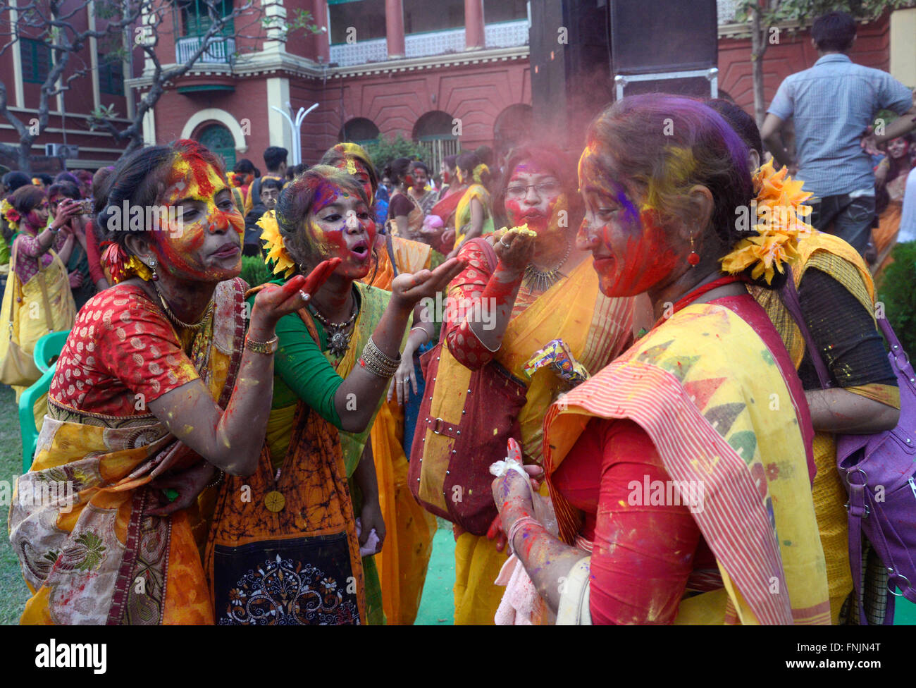 Kolkata, India. 15th Mar, 2016. Students enjoy playing abir ...