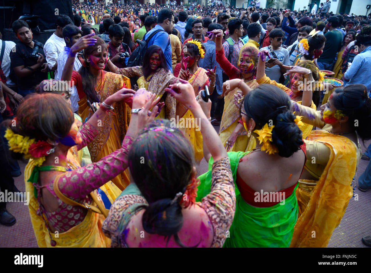 Kolkata, India. 15th Mar, 2016. Students enjoy playing abir ...