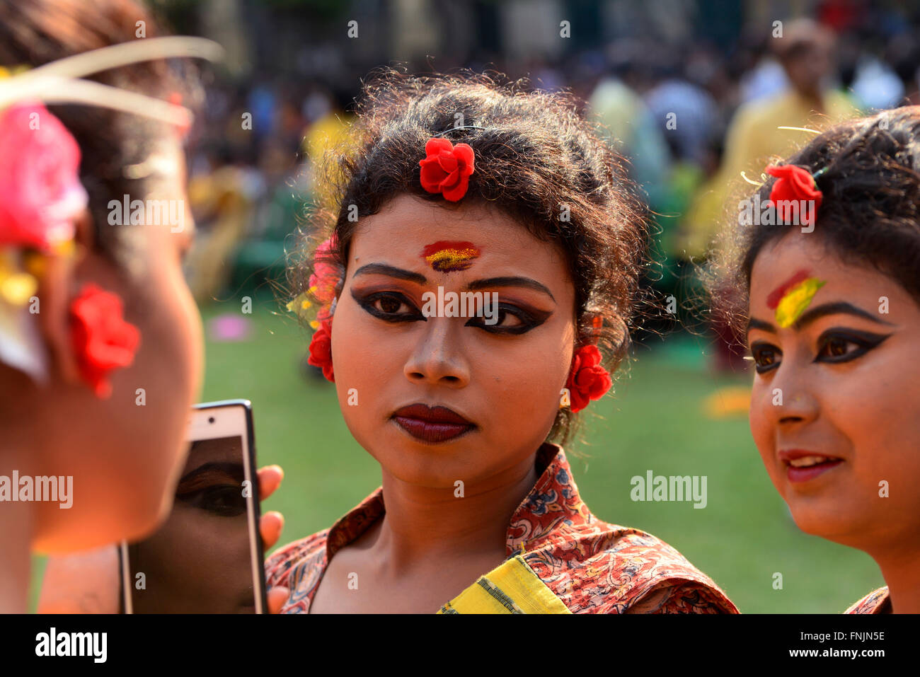 Kolkata, India. 15th Mar, 2016. Students enjoy playing abir ...