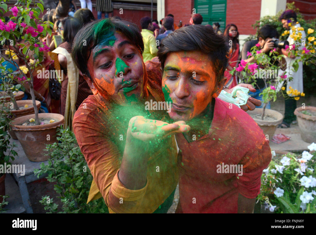 Kolkata, India. 15th Mar, 2016. Students enjoy playing abir ...