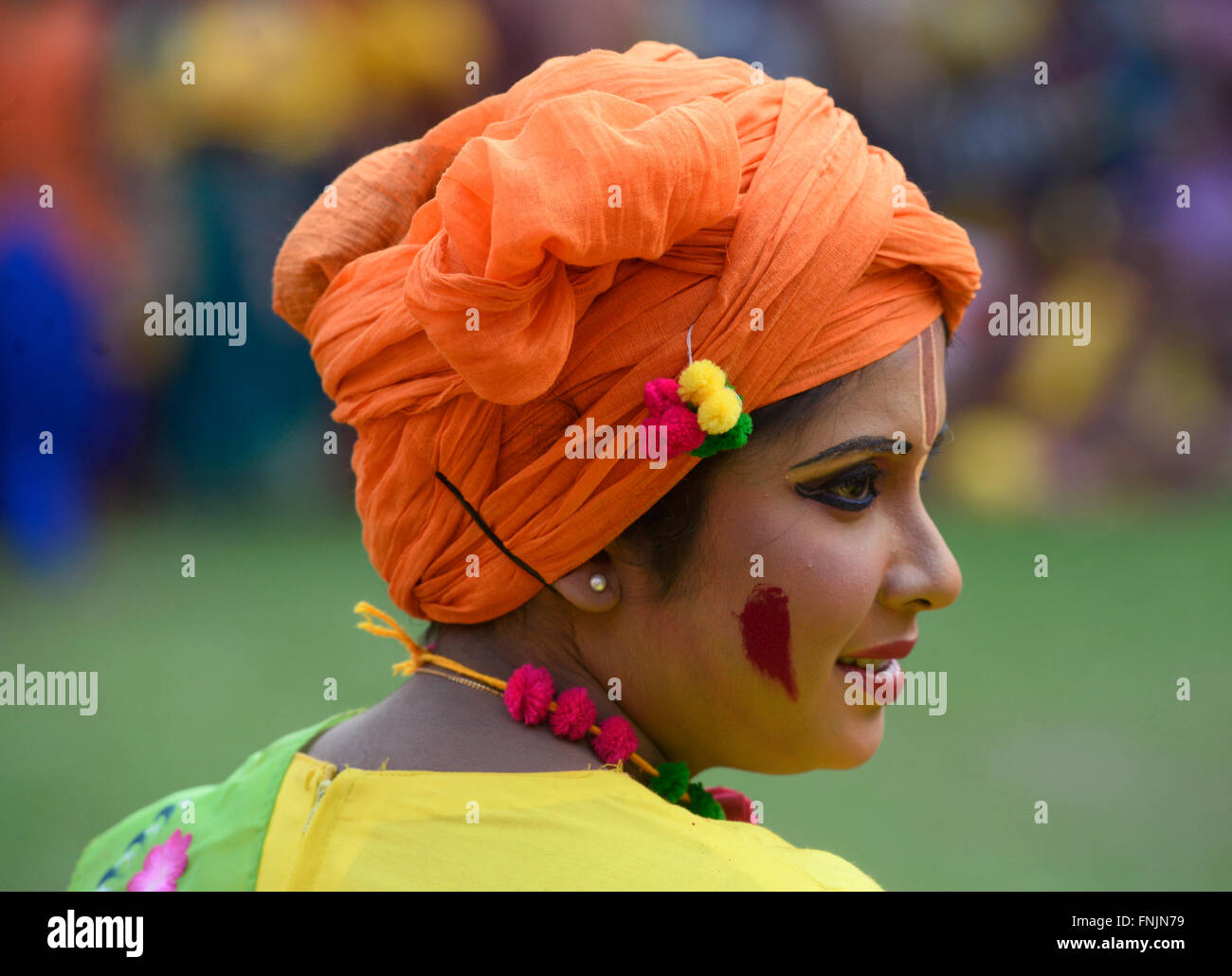 Kolkata, India. 15th Mar, 2016. Student enjoys playing abir ...