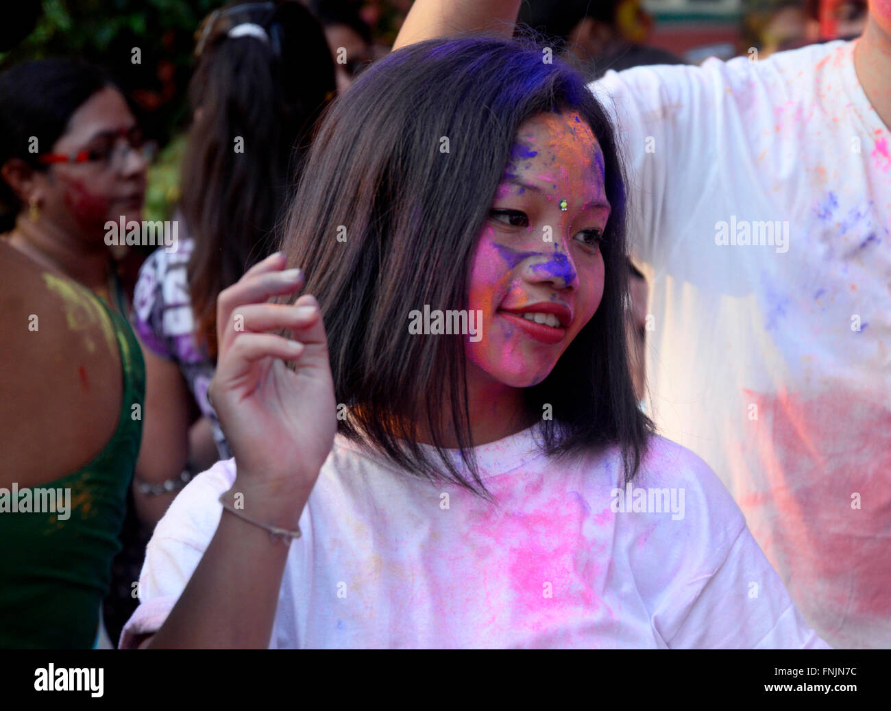Kolkata, India. 15th Mar, 2016. Student enjoys playing abir ...
