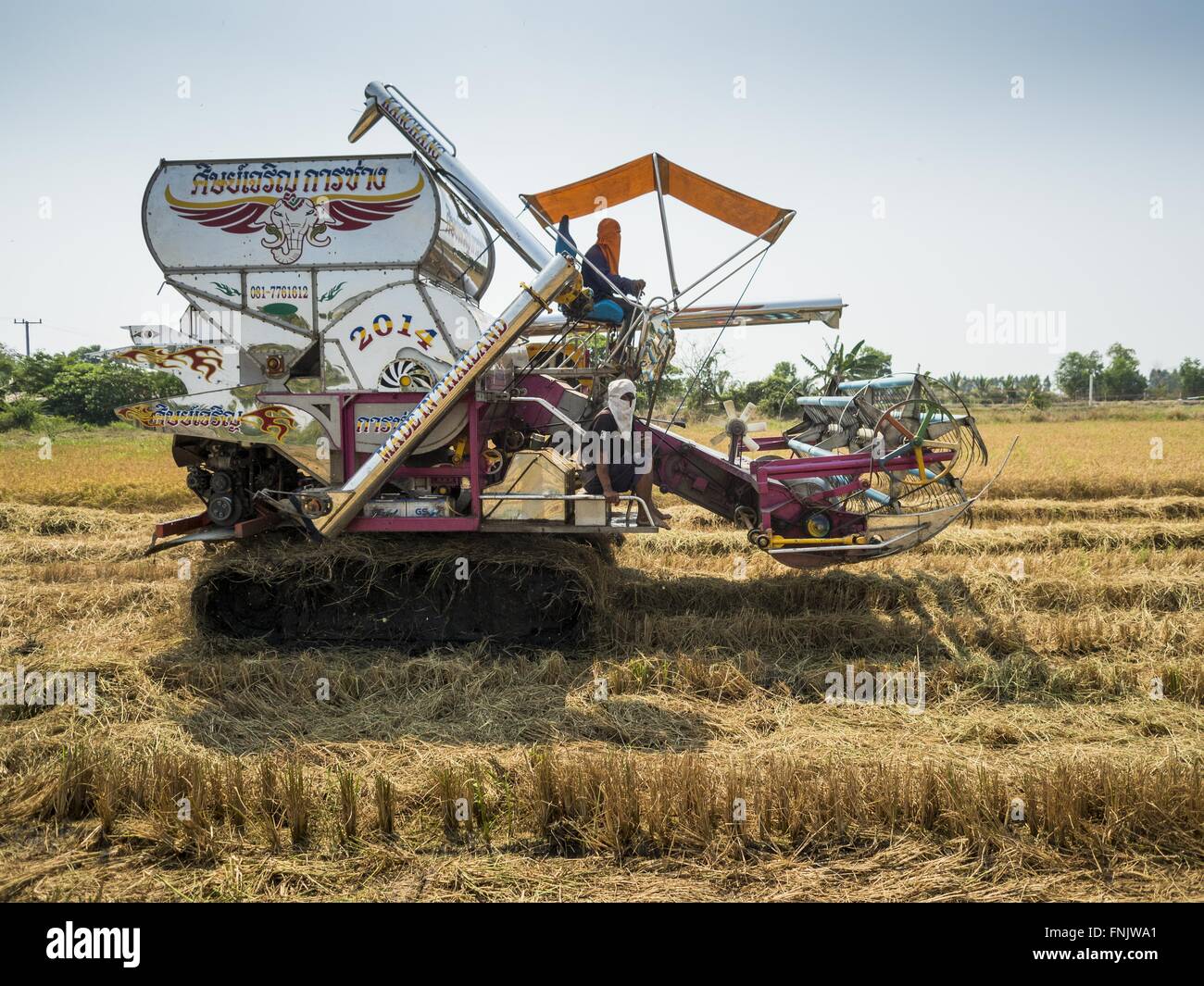 Mechanical rice harvester hi-res stock photography and images - Alamy