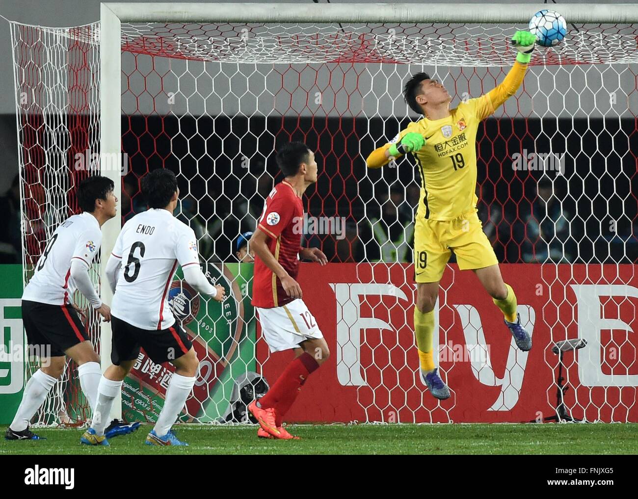Guangzhou, China's Guangdong Province. 16th Mar, 2016. Zeng Cheng (R ...