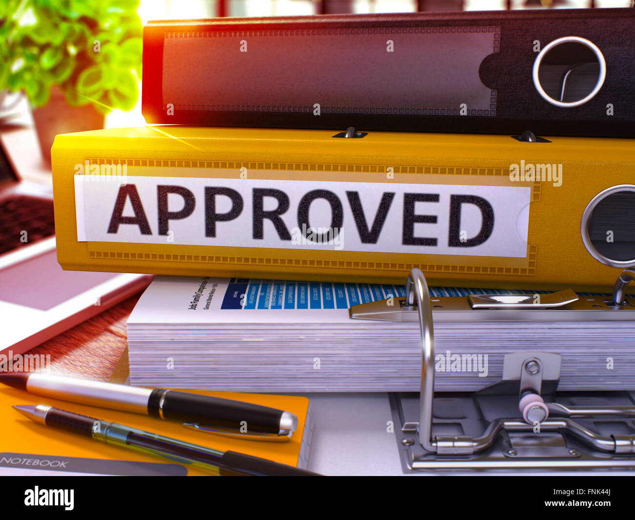 Yellow Office Folder with Inscription Approved Stock Photo - Alamy