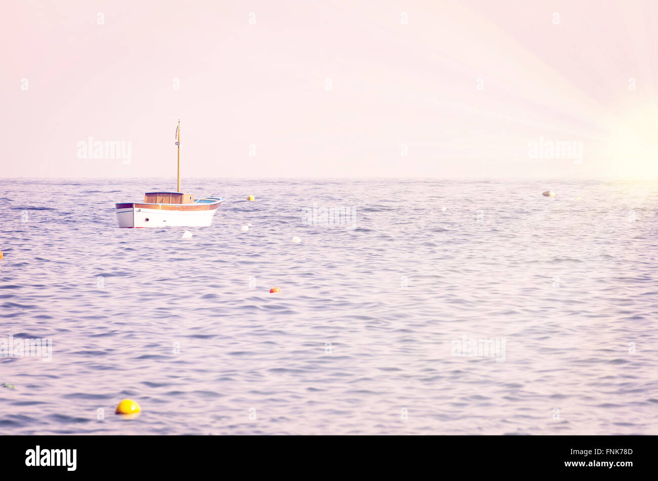 Lonely boat ocean hi-res stock photography and images - Alamy