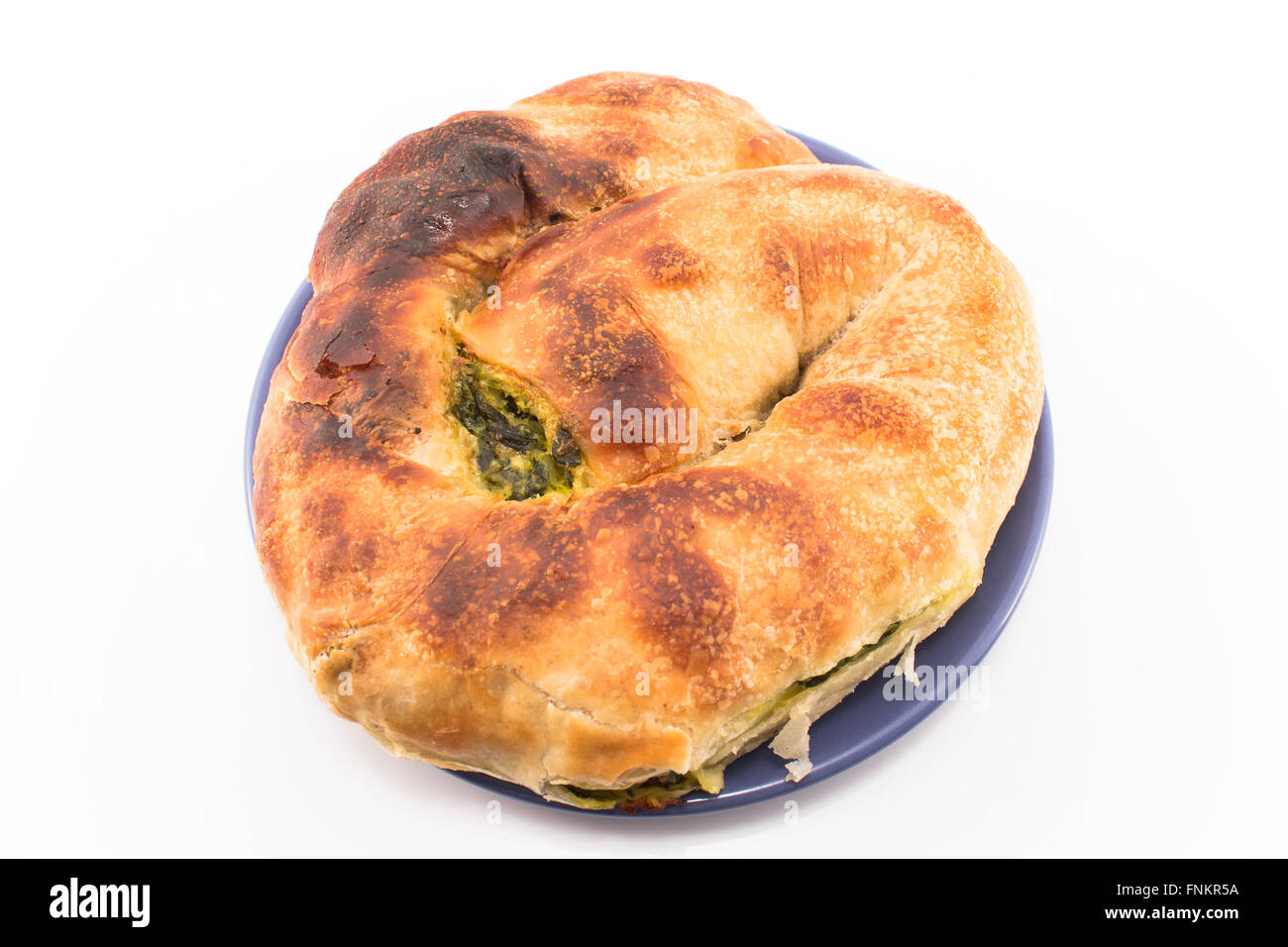 Snail pie with spinach and cheese Stock Photo - Alamy