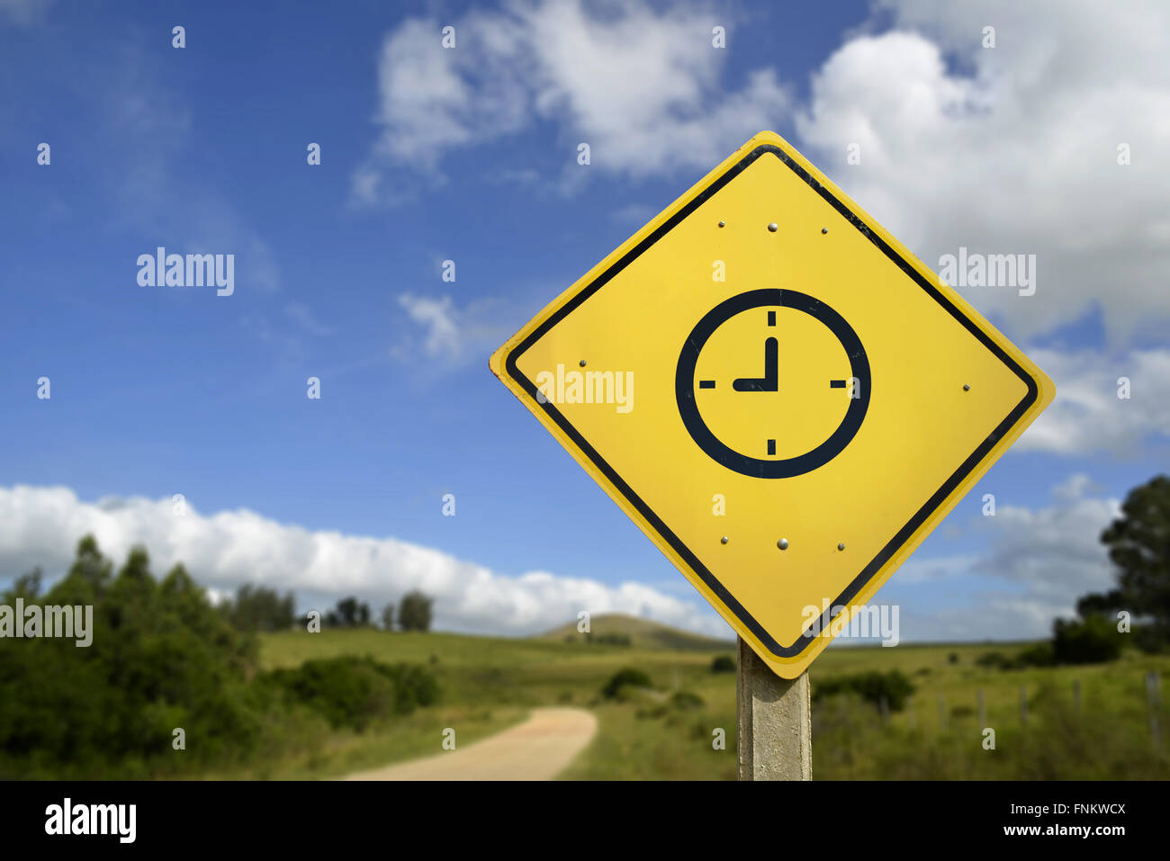 Time to travel and get in touch with nature concept. Clock icon road ...