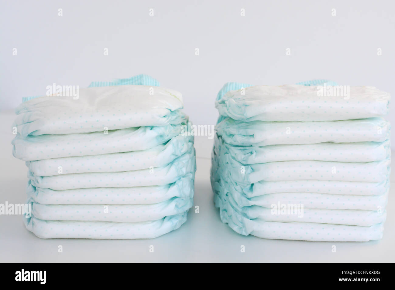 Stack of diapers isolated on white background Stock Photo - Alamy