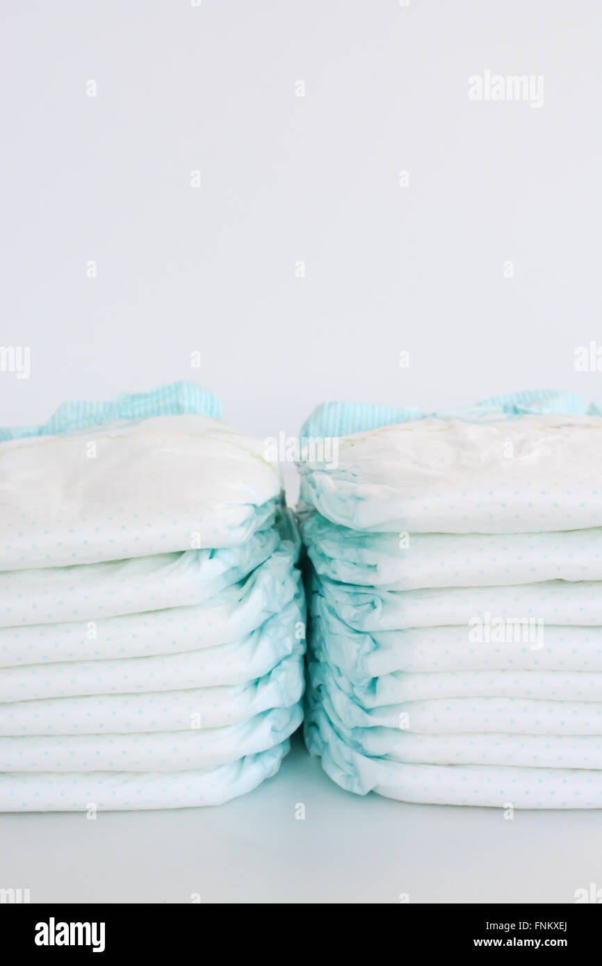 Stack of diapers isolated on white background Stock Photo - Alamy
