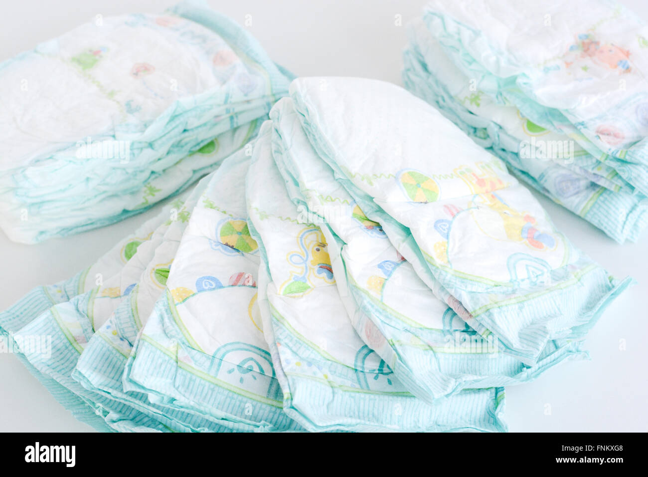 Stack of diapers isolated on white background Stock Photo - Alamy