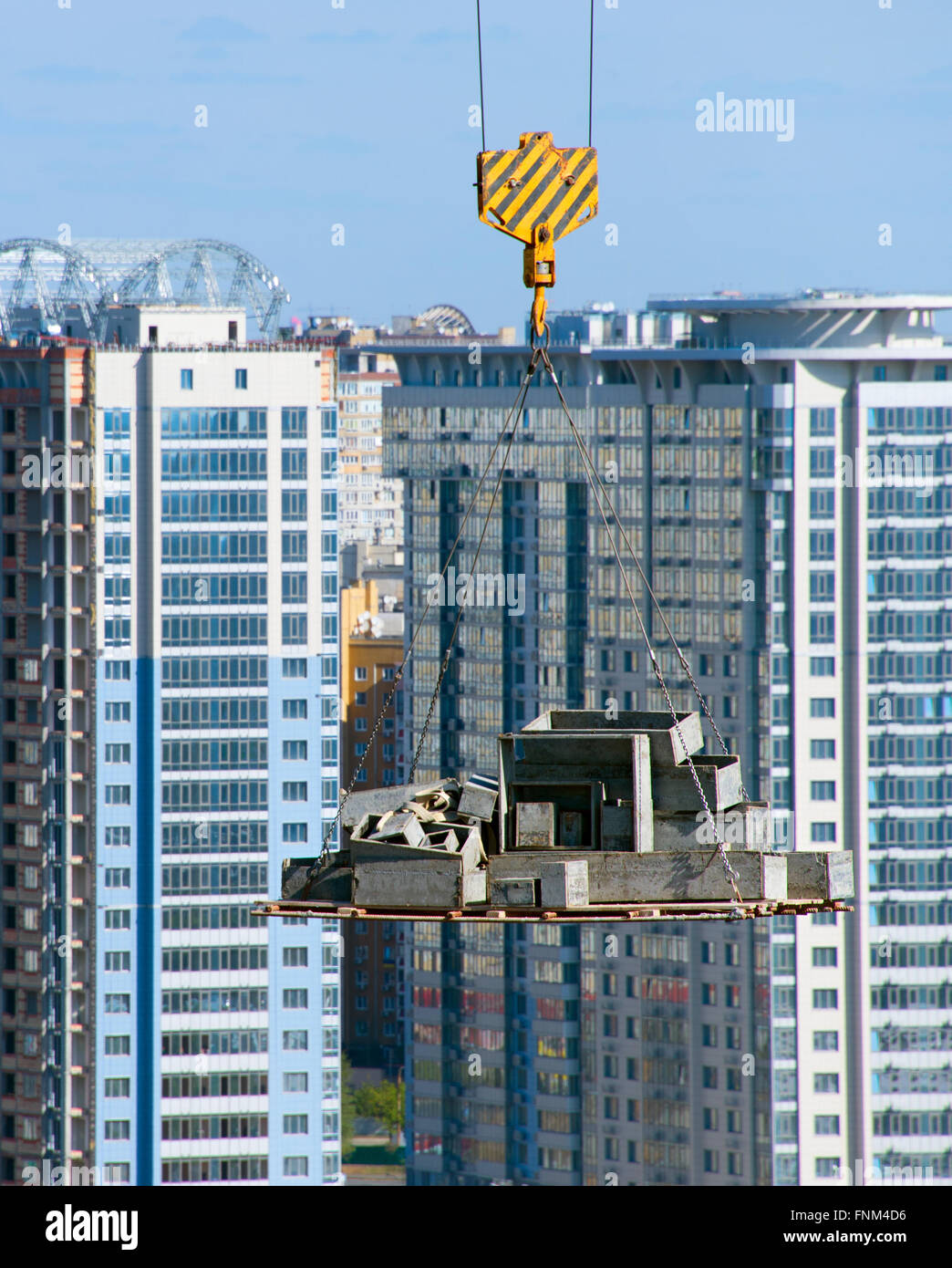Hanging concrete bloks. Modern apartment buildings on the background ...