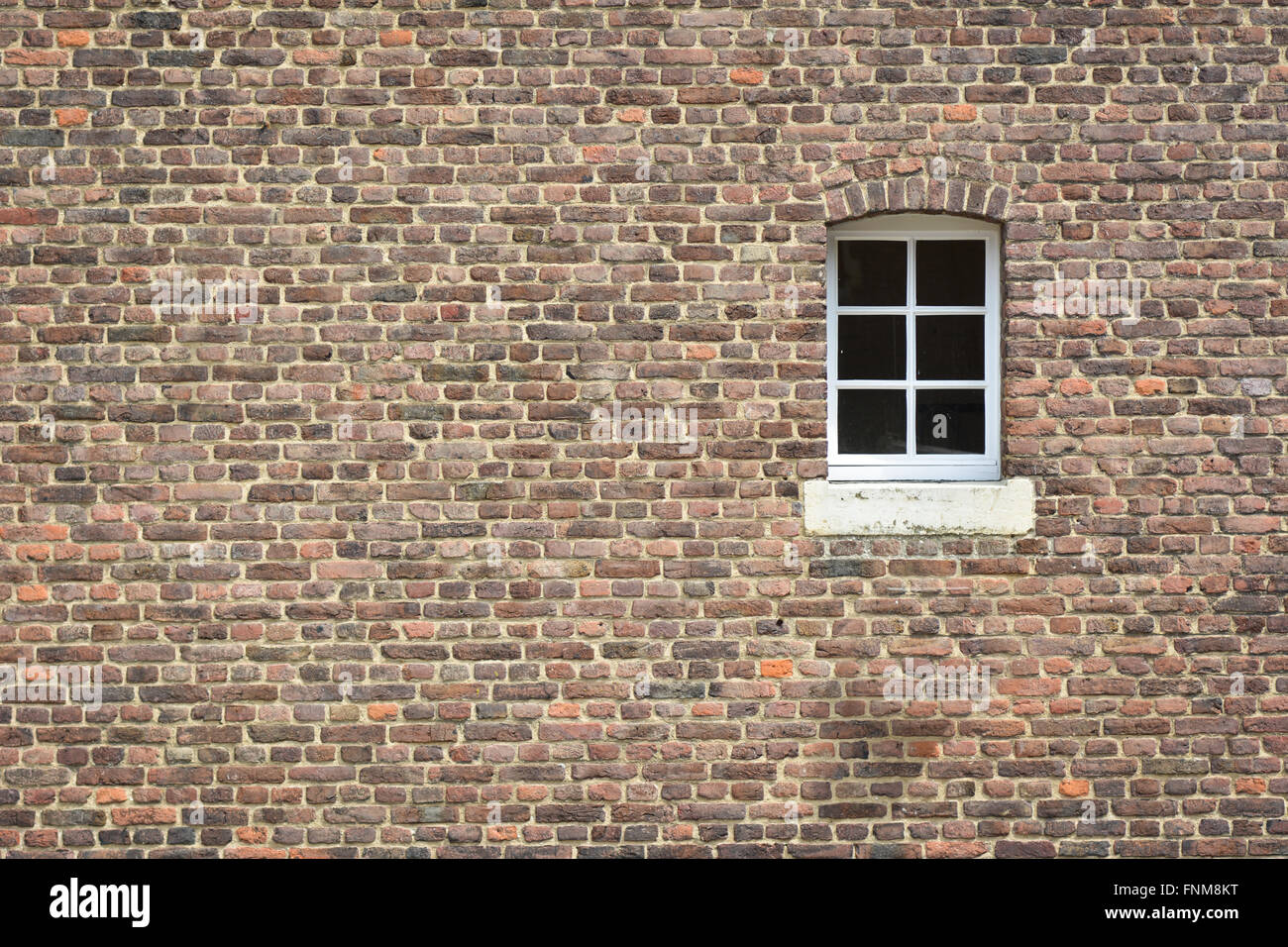 brick wall of old castle with window Stock Photo - Alamy