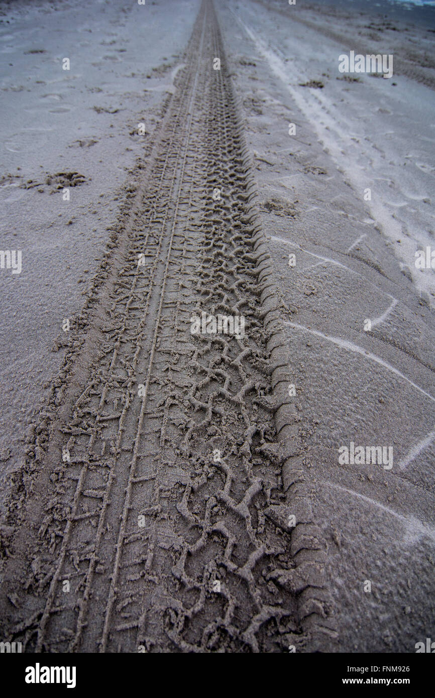 tire tracks on beach closeup Stock Photo - Alamy