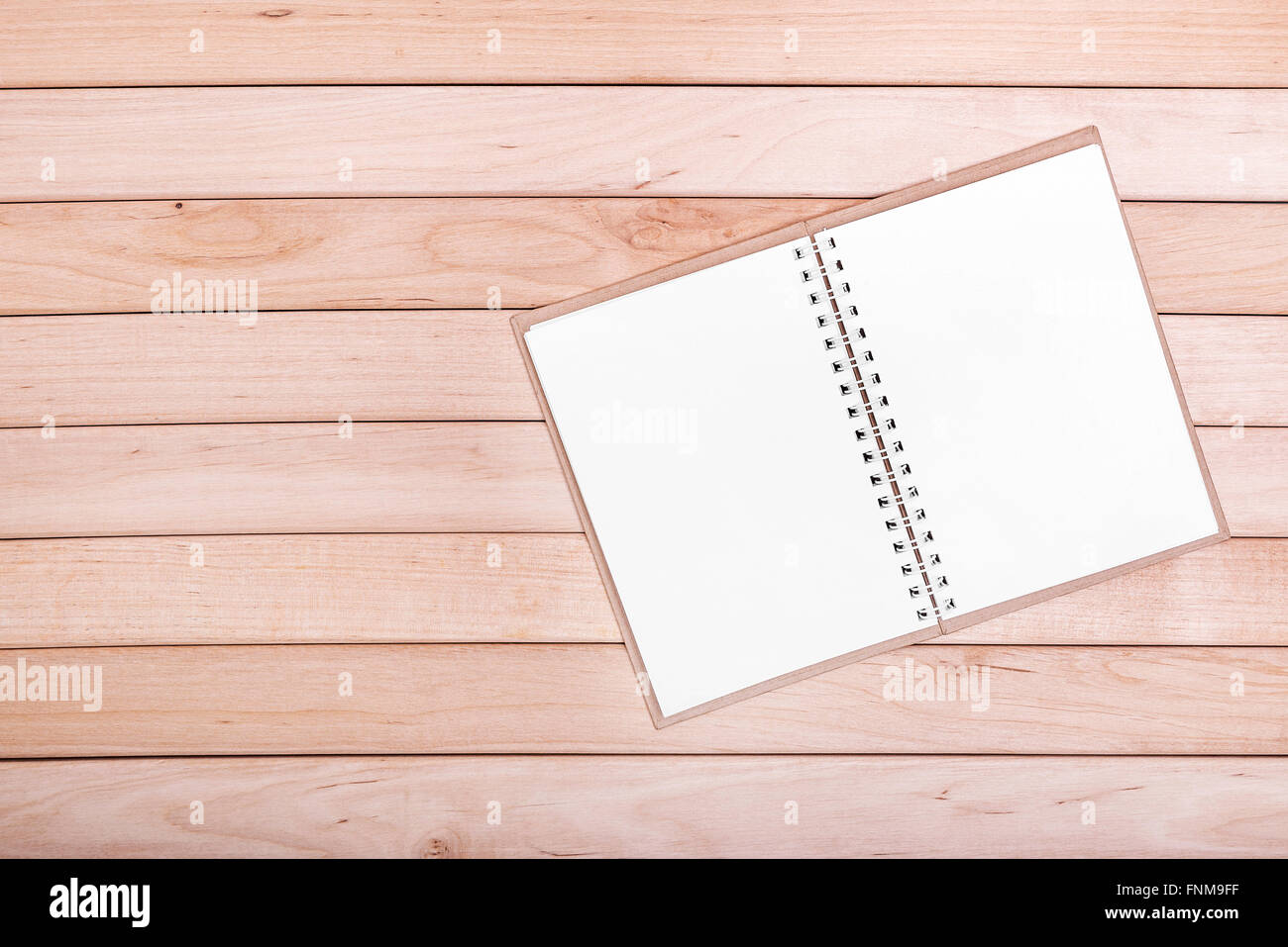 Notebooks on the background of wooden boards Stock Photo - Alamy
