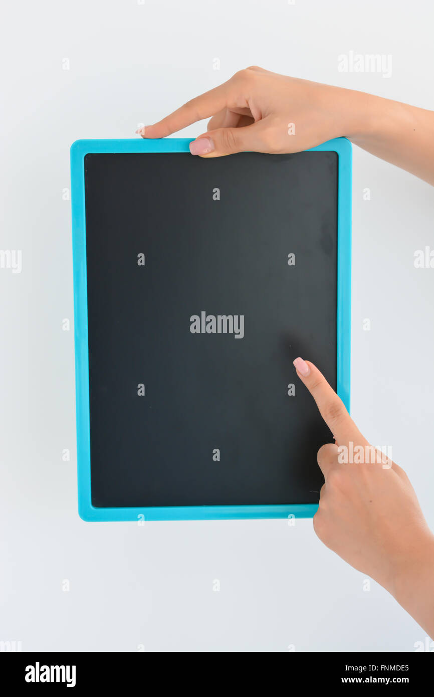 Pointing hand on blackboard Stock Photo - Alamy