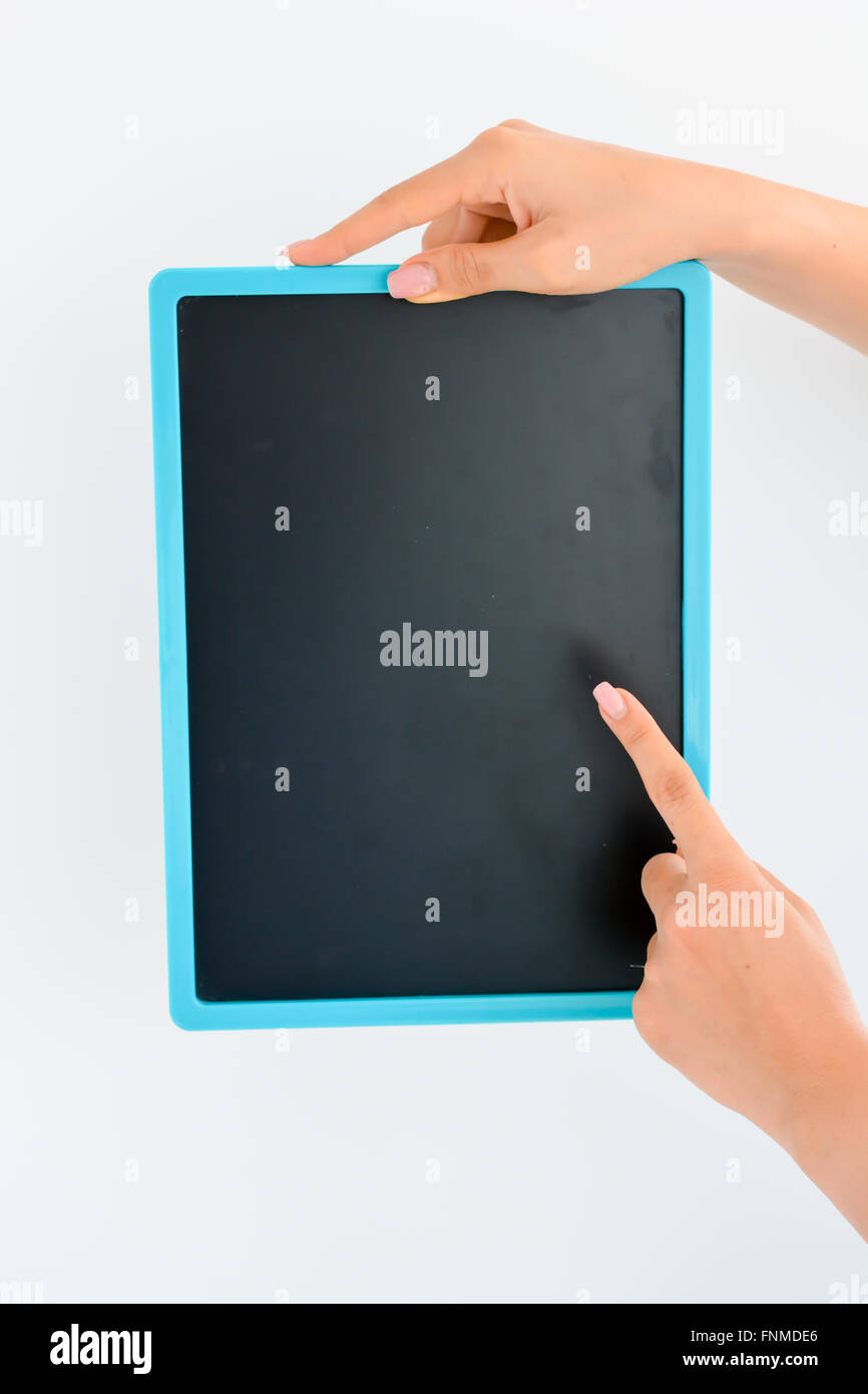 Pointing hand on blackboard Stock Photo - Alamy