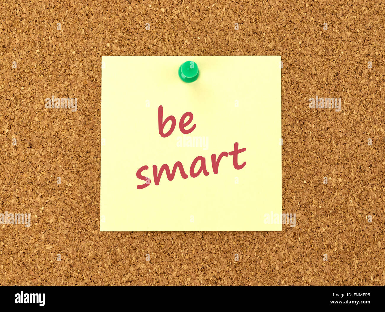 The phrase Be Smart in red text on a yellow sticky note posted to a ...