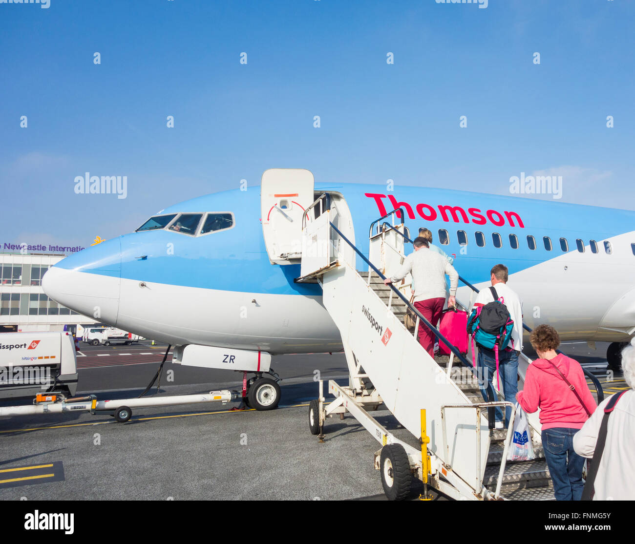 Passengers boarding plane hi-res stock photography and images - Alamy