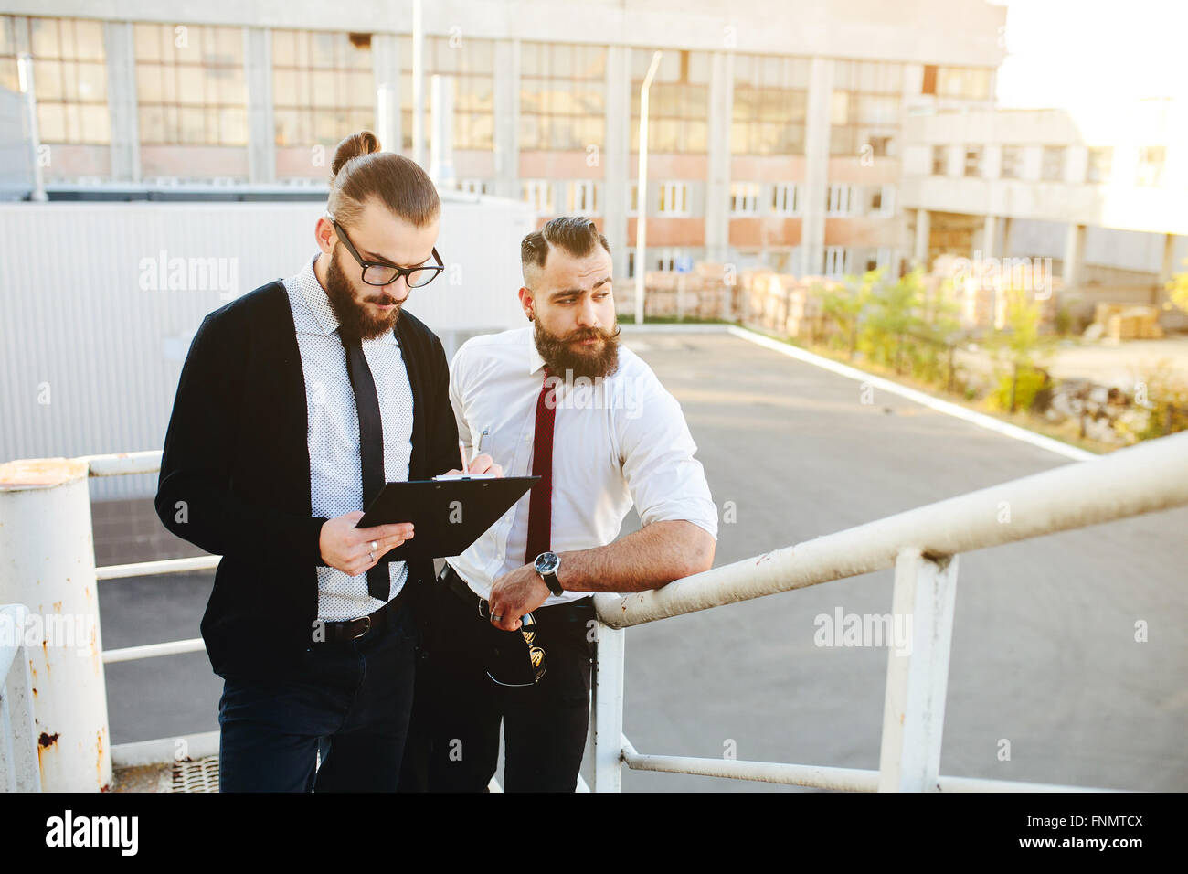 Two businessman at work Stock Photo - Alamy