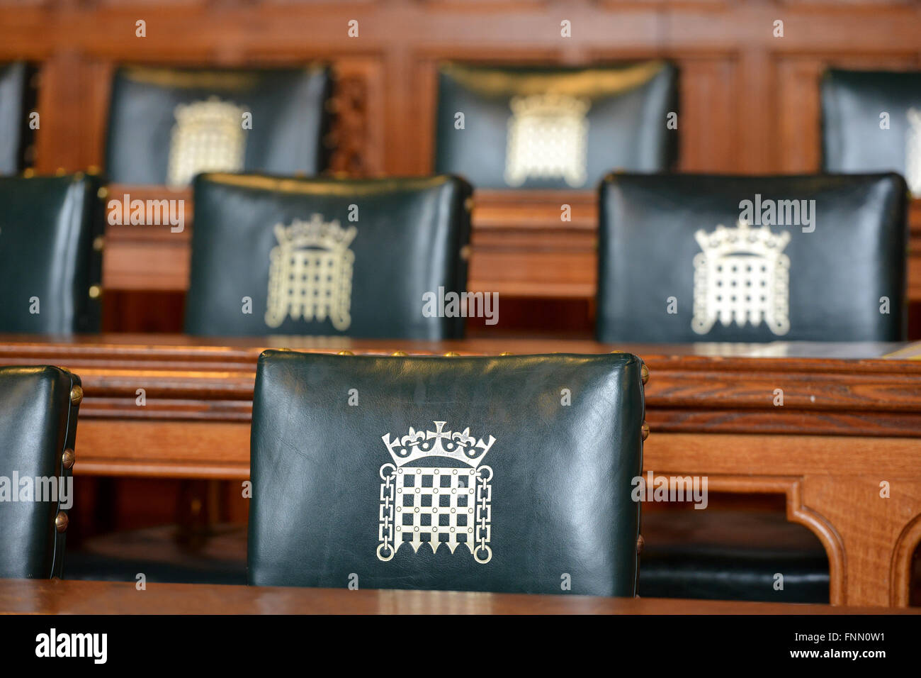 Chairs showing portcullis crest in a Palace of Westminster committee ...
