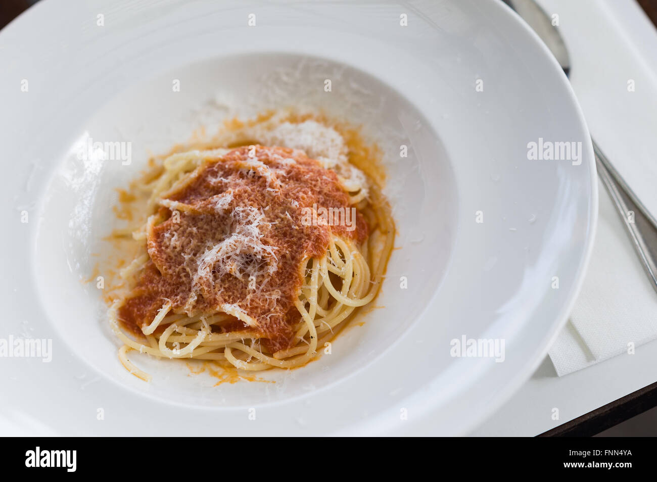 Delicious fine dining order of Italian tomato spaghetti topped with ...