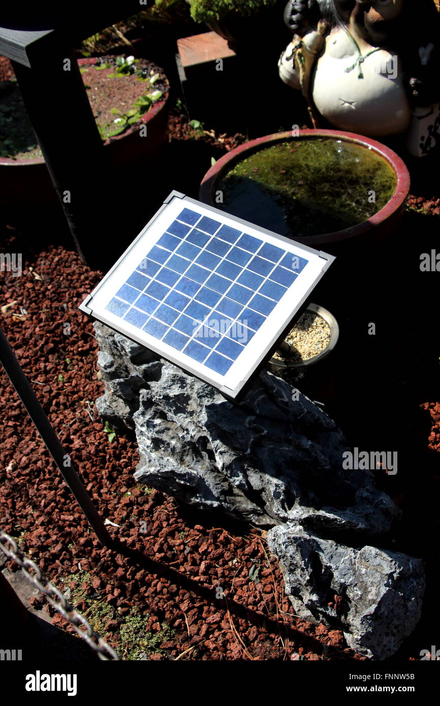 Solar panel in the garden Stock Photo - Alamy