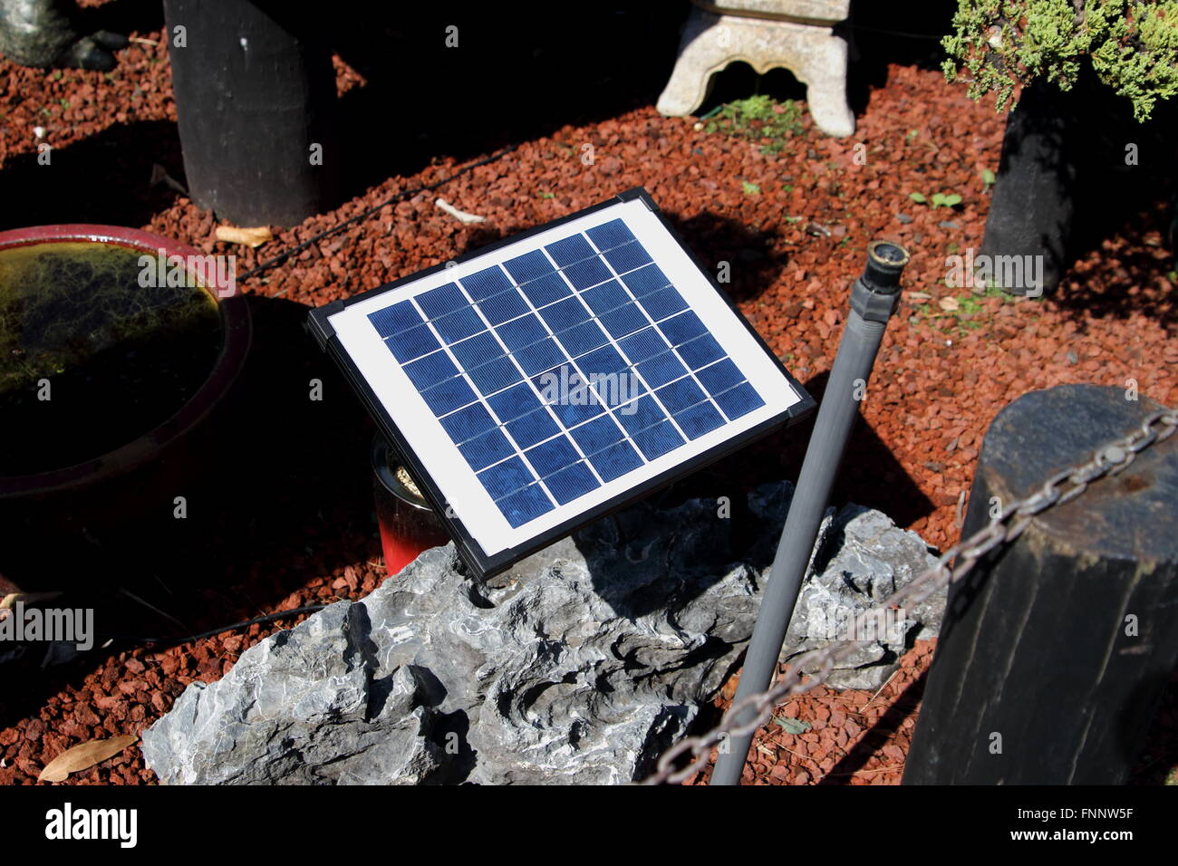 Solar panel in the garden Stock Photo - Alamy