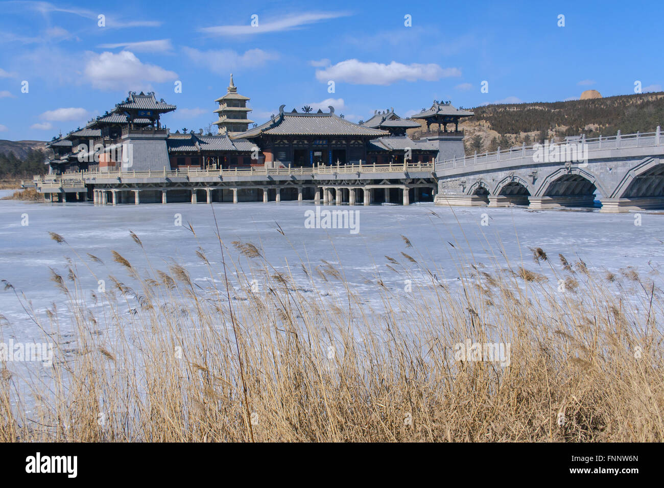 Chinese style antique imitation buildings in the center of the lake ...