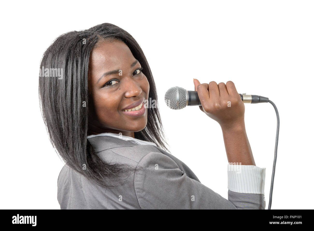 a young African american journalist with a microphone, white background ...