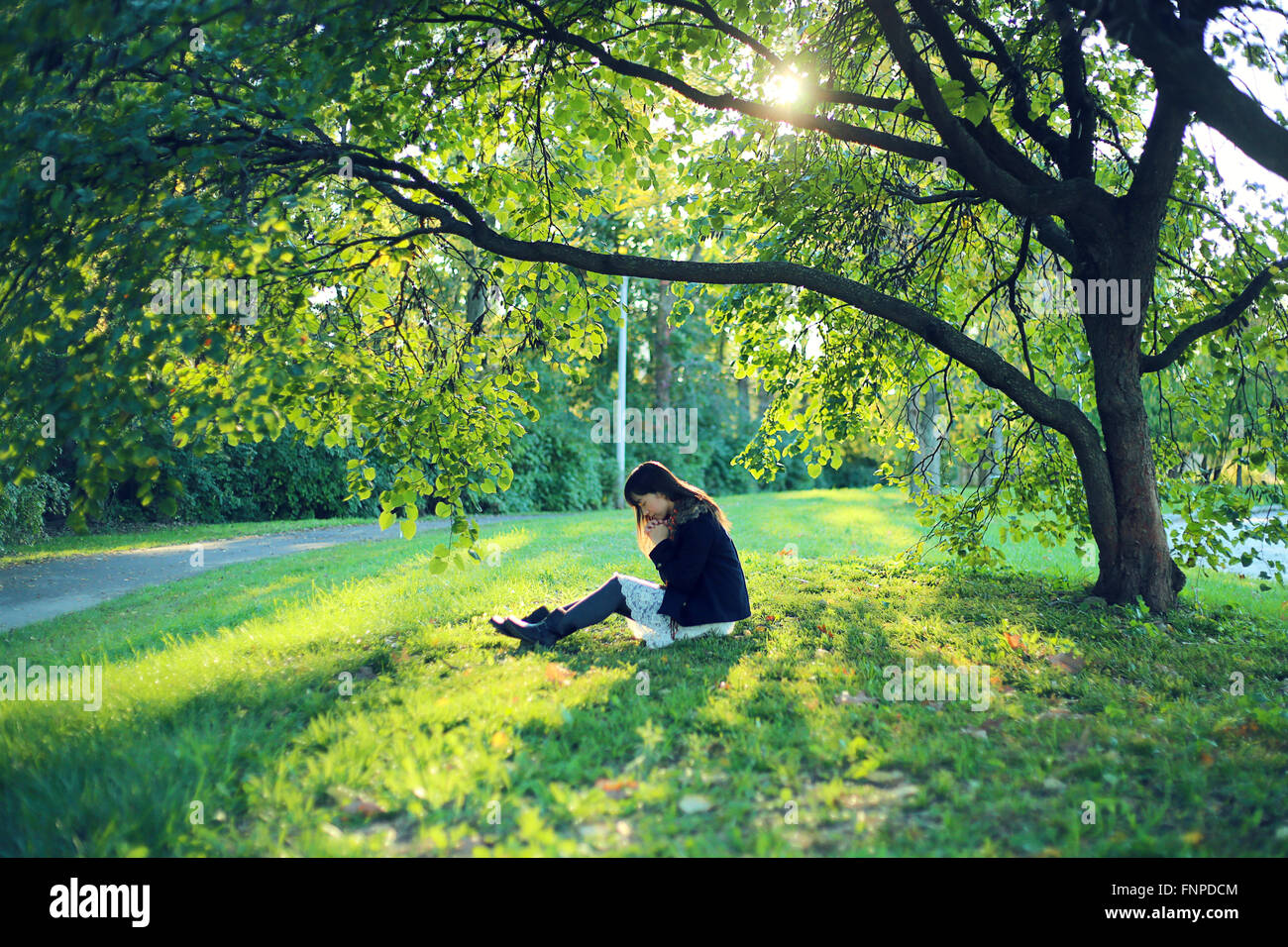 Praying in the nature Stock Photo - Alamy