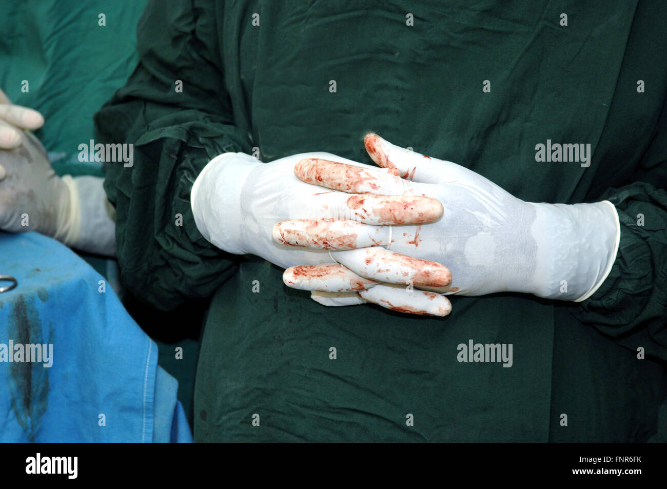 Blood stained hands hi-res stock photography and images - Alamy