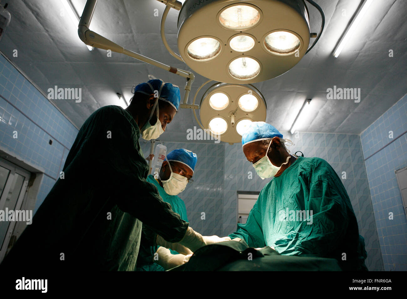 A surgical team operate on a patient Stock Photo - Alamy