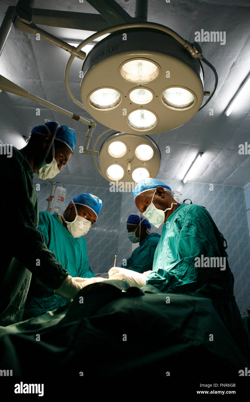 A surgical team operate on a patient Stock Photo - Alamy