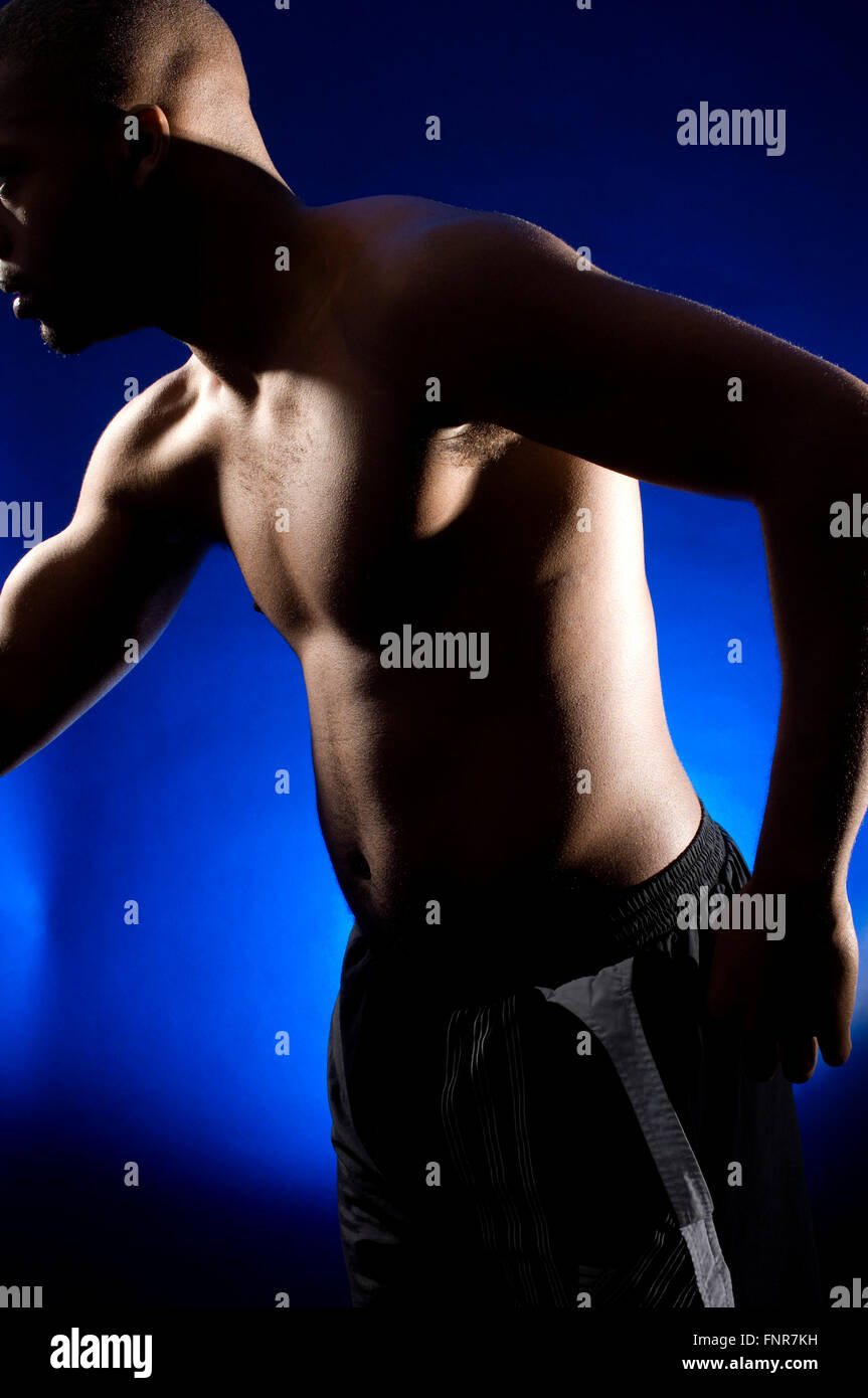 Man in great physical shape working out, toned muscles Stock Photo - Alamy